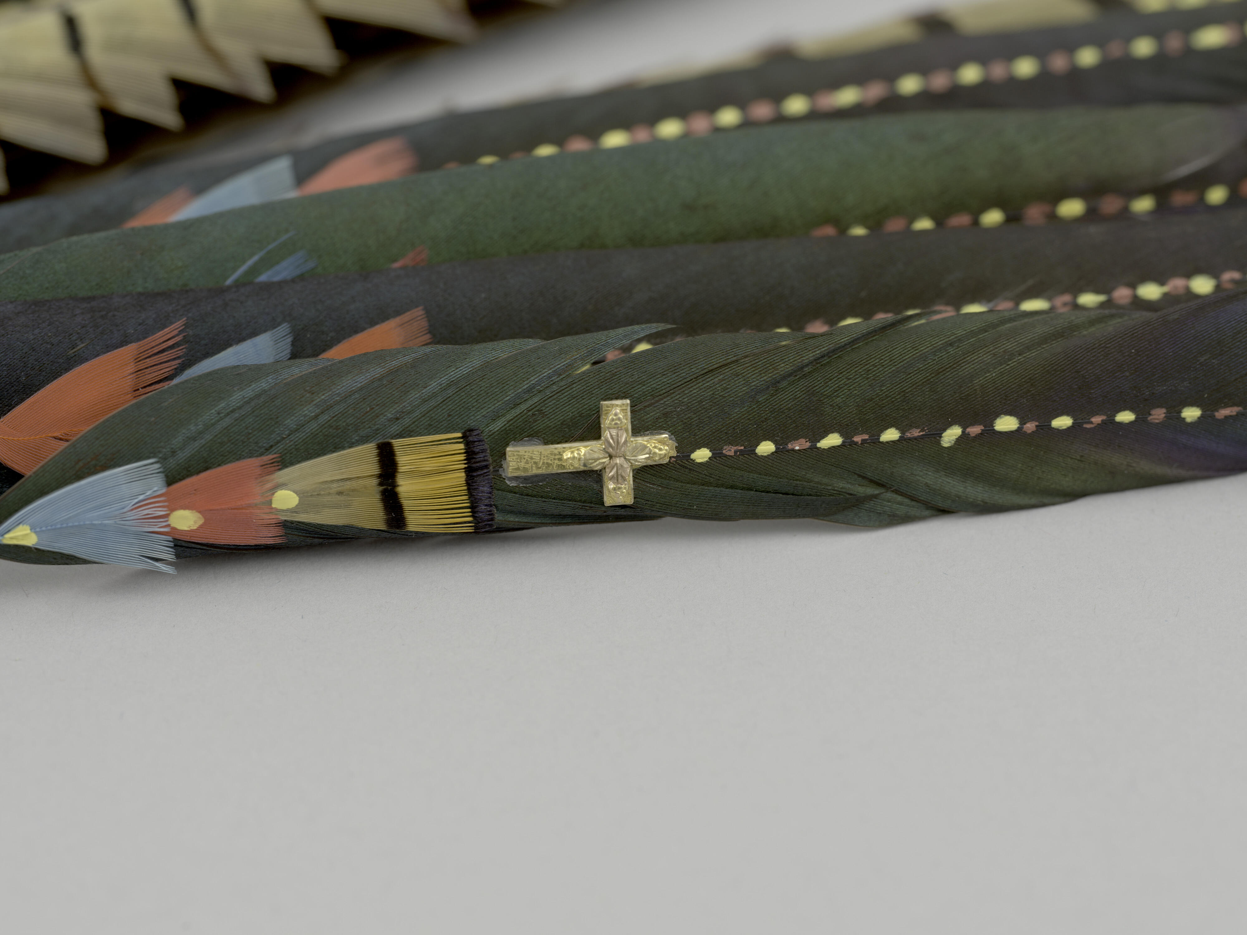 Painted Native American Church fan decorated with jewelry cross and ...