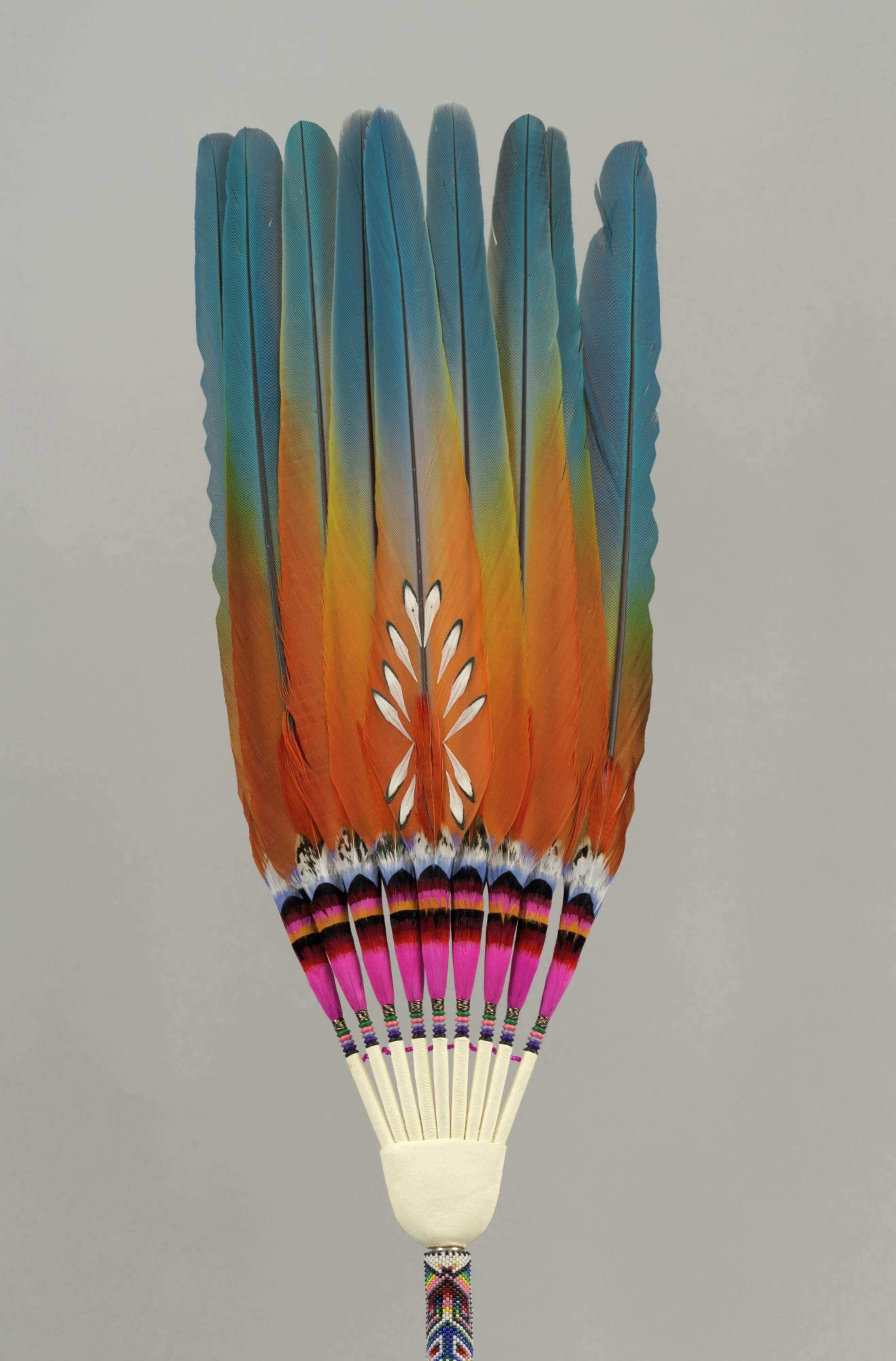 Macaw feather peyote fan with beaded handle and loose fringe / Unknown ...